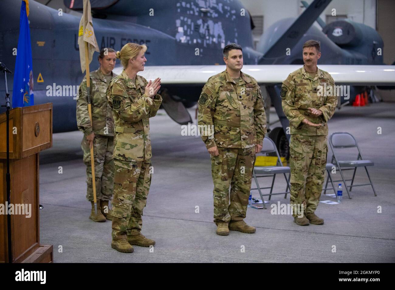 U.S. Air Force Lt. Col. Michael E. Joanos (center), 99th Expeditionary ...