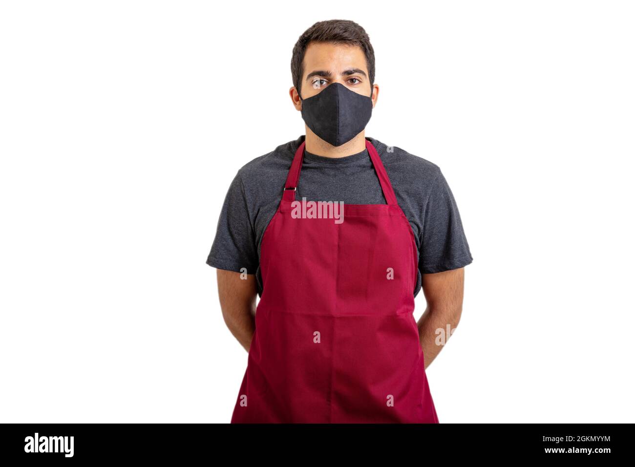 Man with red apron and face protective mask standing against white ...