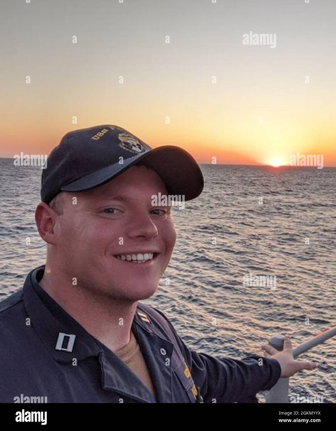 Lt. Ben Pederson, navigator on board USS Patriot (MCM 7) poses for a ...