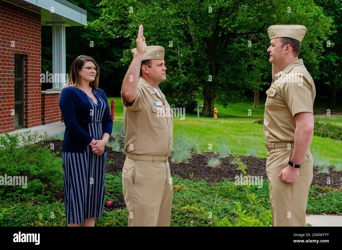Cmdr. Michael Graham administers the oath of office to Lt. Cmdr. Rick ...