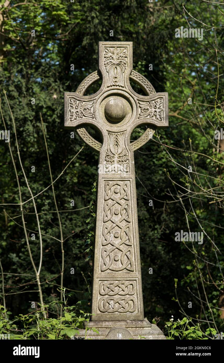 Ornately carved Celtic cross memorial, gravestone / tombstone, grave ...