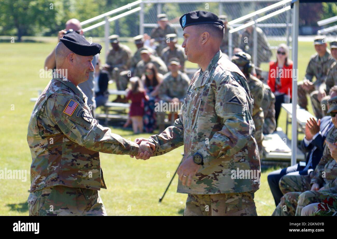 U.S. Army Brig. Gen. Christopher R. Norrie, right, outgoing commander ...