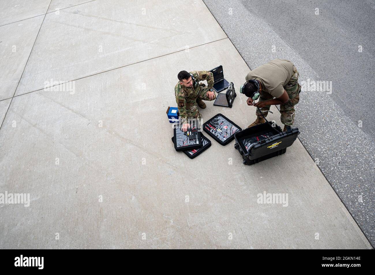 Senior Airman Elijah Turner and Senior Airman Clayton Roppa, 911th ...