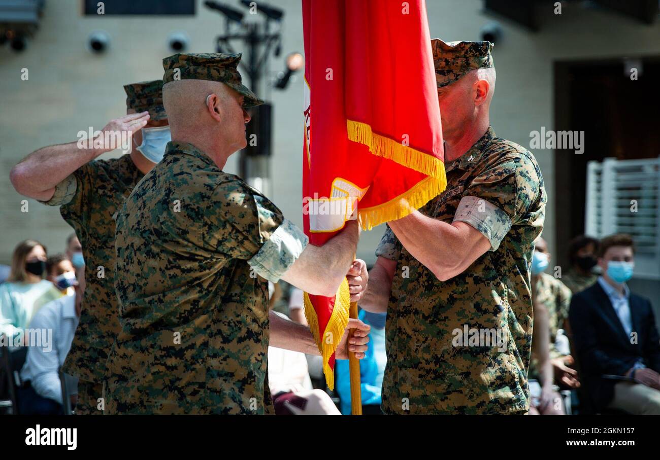 U.S. Marine Corps Col. Bret M. Hyla, left, assumes his duties as the ...