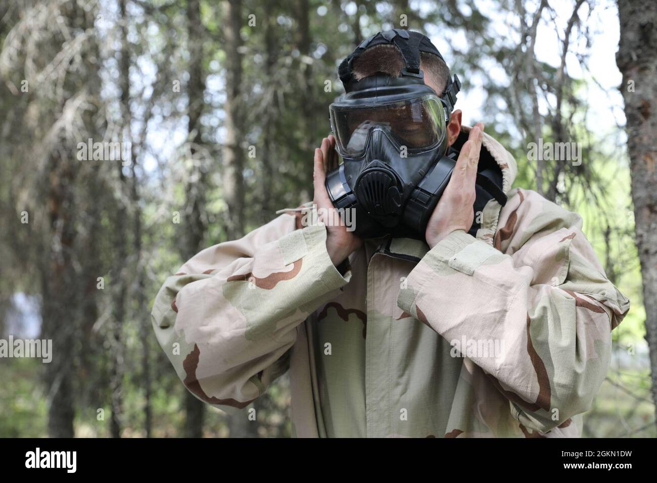 Staff Sgt. Iott, 59th Signal Battalion, secures the seal on his pro ...