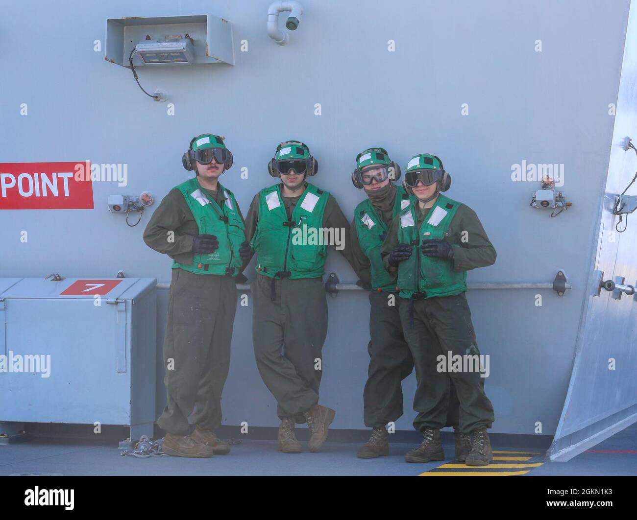 US Marines with Marine Fighter Attack Squadron (VMFA) 211 pose after ...