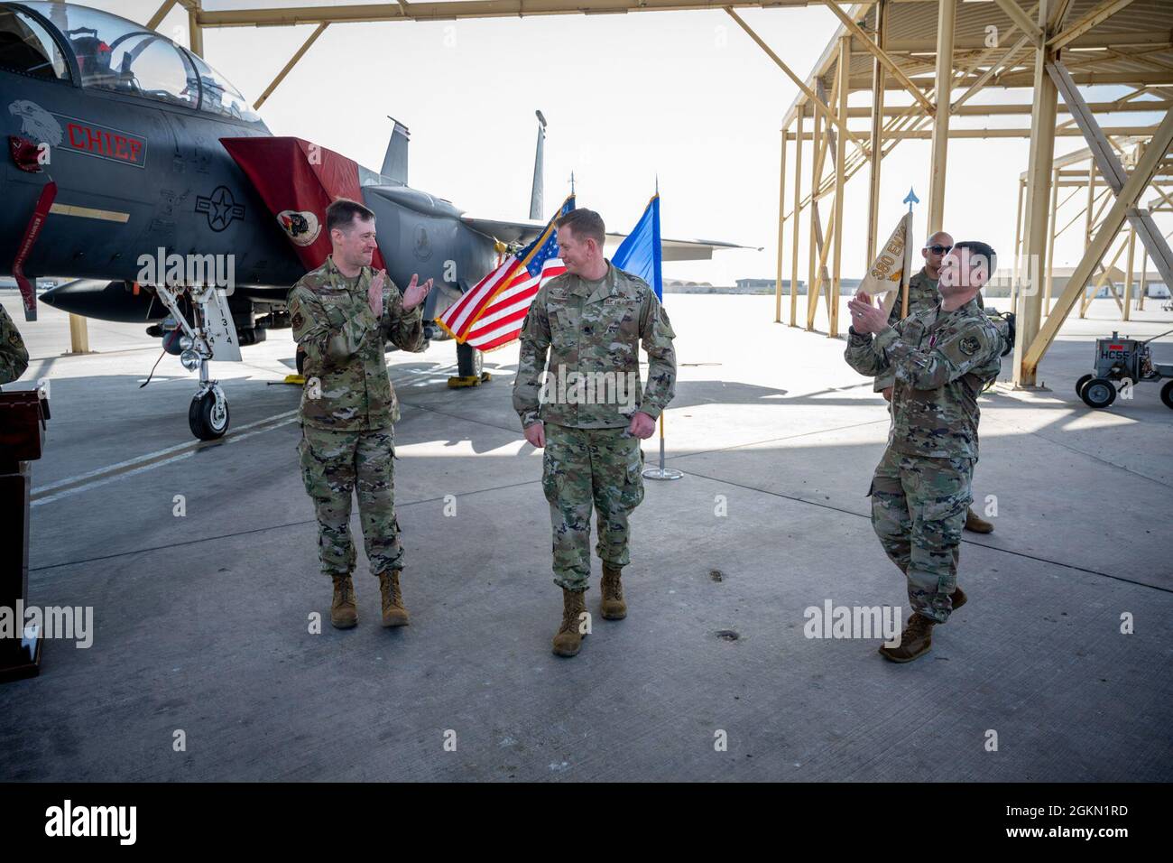 U.S. Air Force Lt. Col. Jason Purcell (center), 380th Expeditionary ...