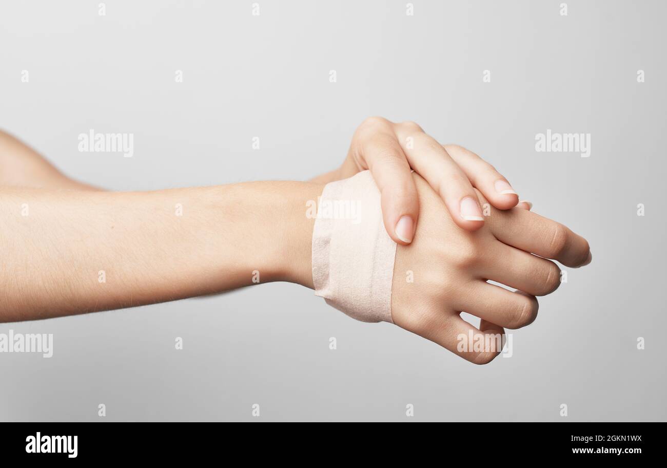 bandaged arm injury health problems medicine Stock Photo - Alamy