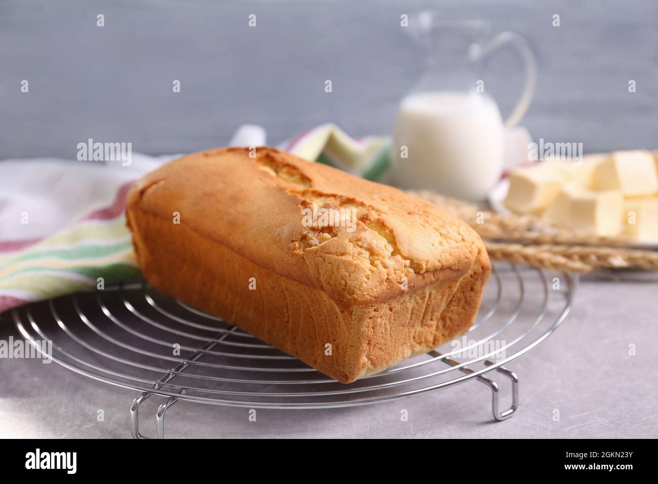 Baked butter cake with ingredients on table Stock Photo - Alamy