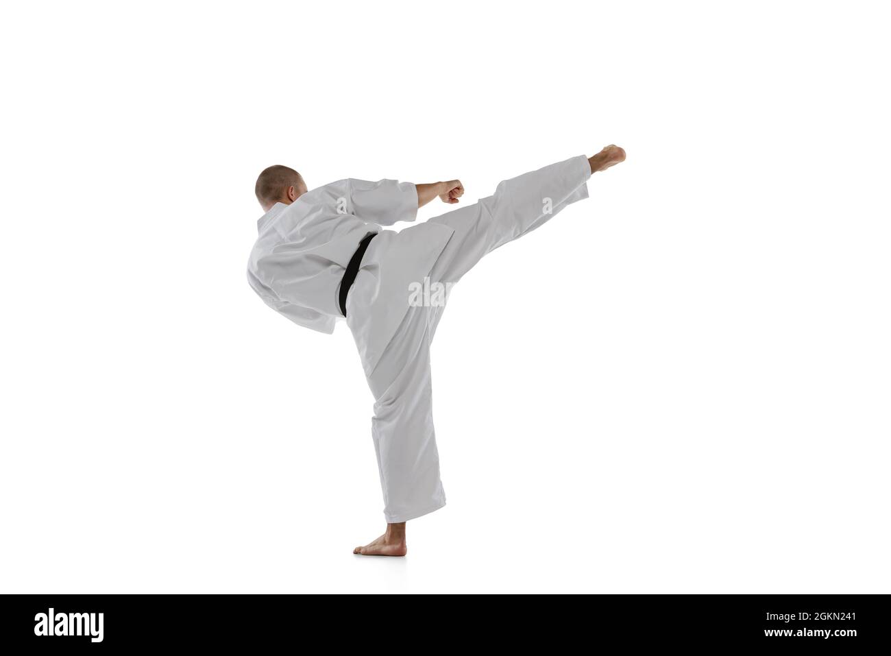 Back view. Full-length portrait of caucasian sportsman standing in side ...