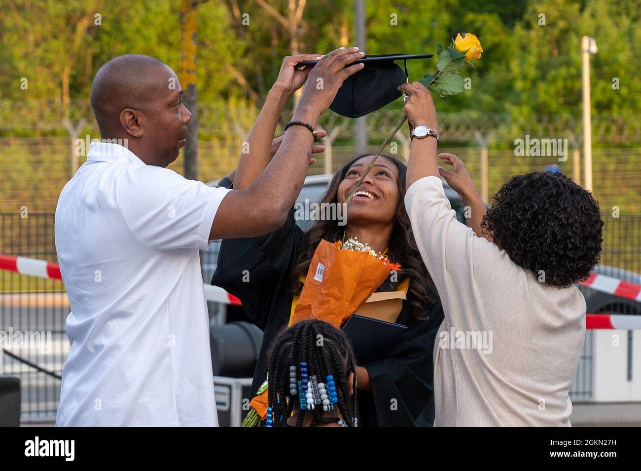 A Stuttgart High School graduate has fun while taking photos during an ...
