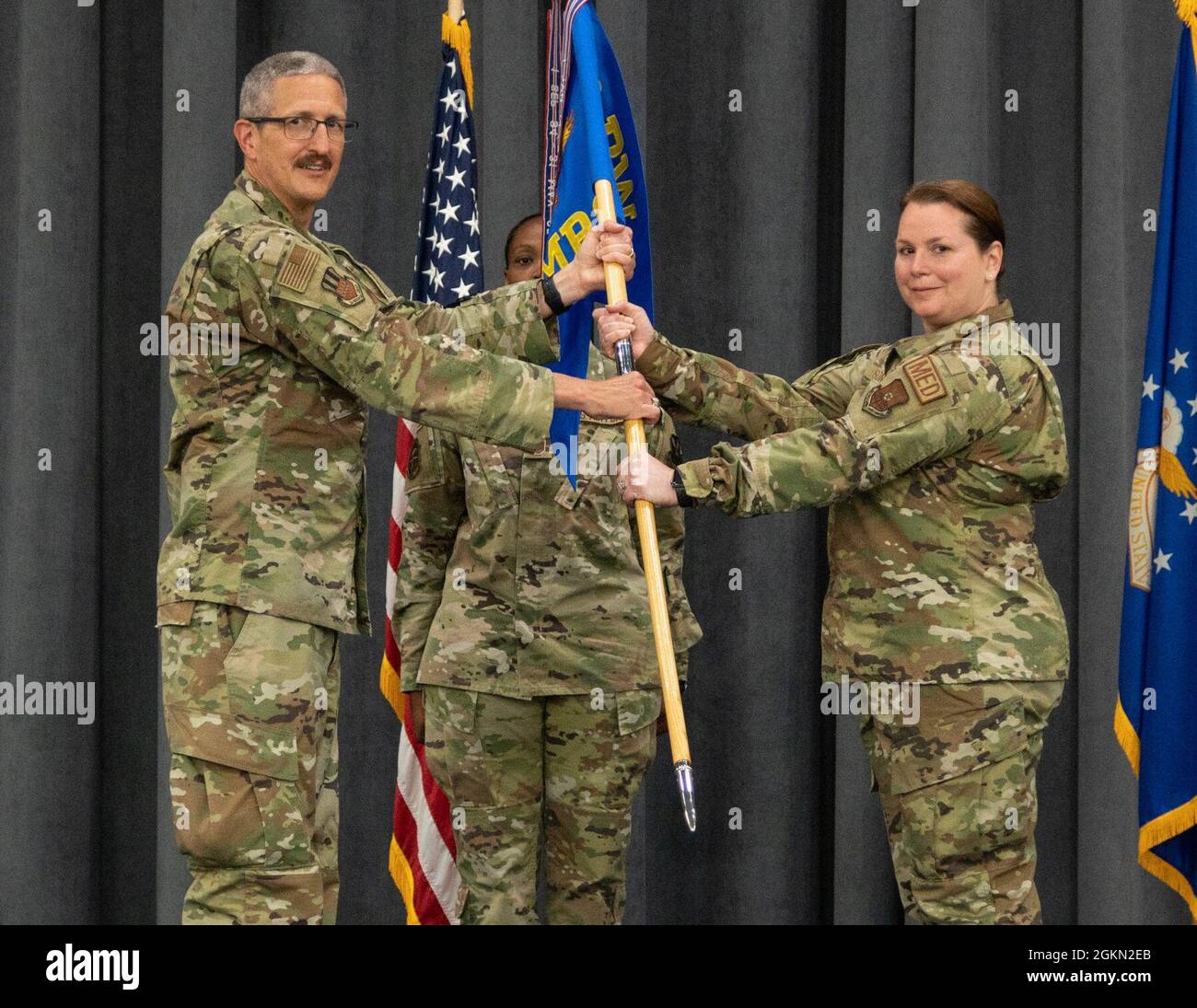 Lt. Col. Amy Johnson, right, incoming 2nd Operational Medical Readiness ...