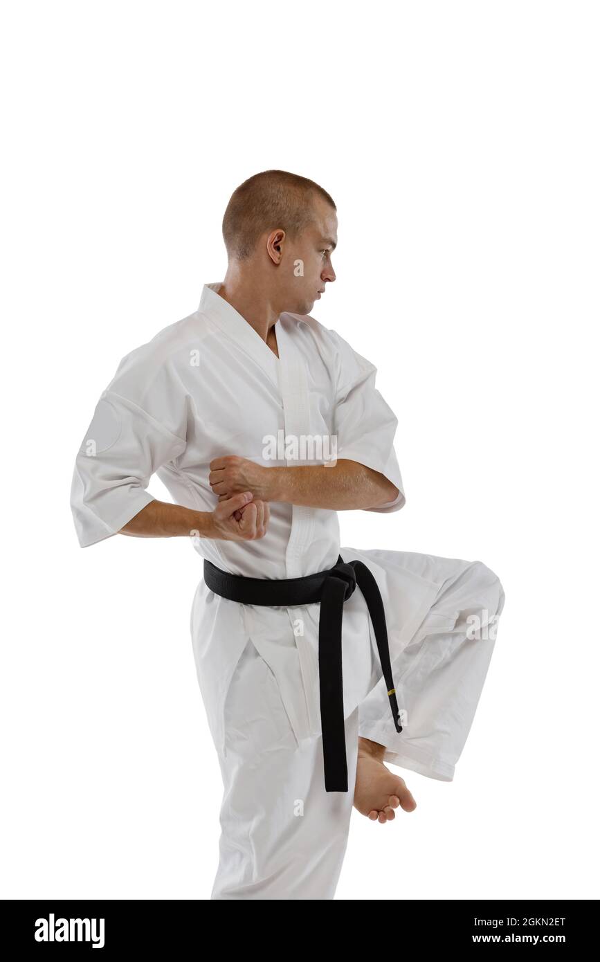 Side view. One caucasian sportsman standing in a fight pose isolated ...