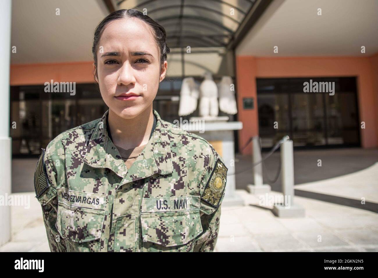 Yeoman Seaman Angela MelendezVargas poses for a photo as Commander ...