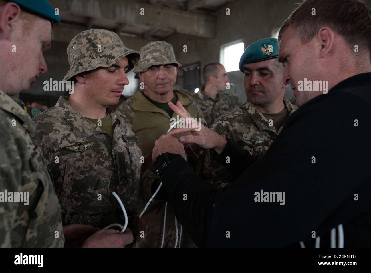 U.S. Marine Corps Staff Sgt. Thomas Foulke, right, an infantry unit ...