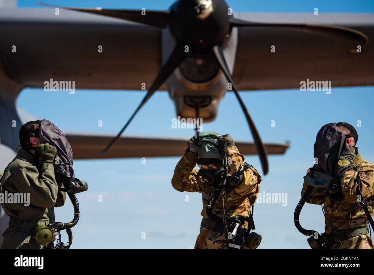 1st Lt. Coltan Nading, 40th Airlift Squadron pilot, left, Capt. Miranda ...
