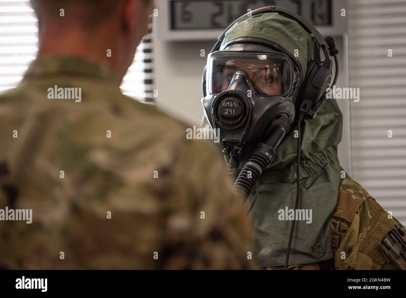 Capt. Miranda Mila, 40th Airlift Squadron pilot, tests a gas mask at ...