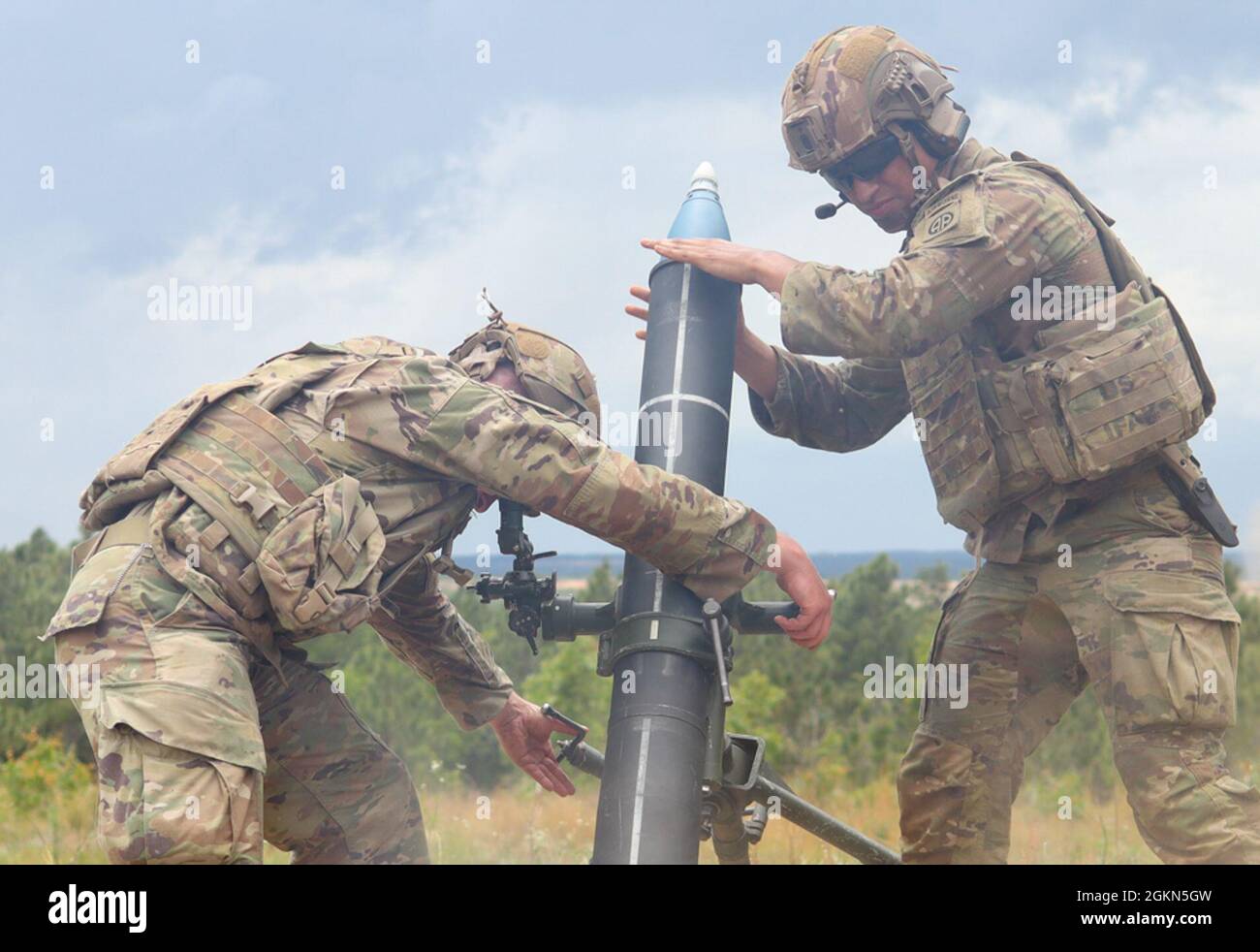 U.S. Army Spc. Jack Hart, left, and Spc. Mark Corranza, right ...