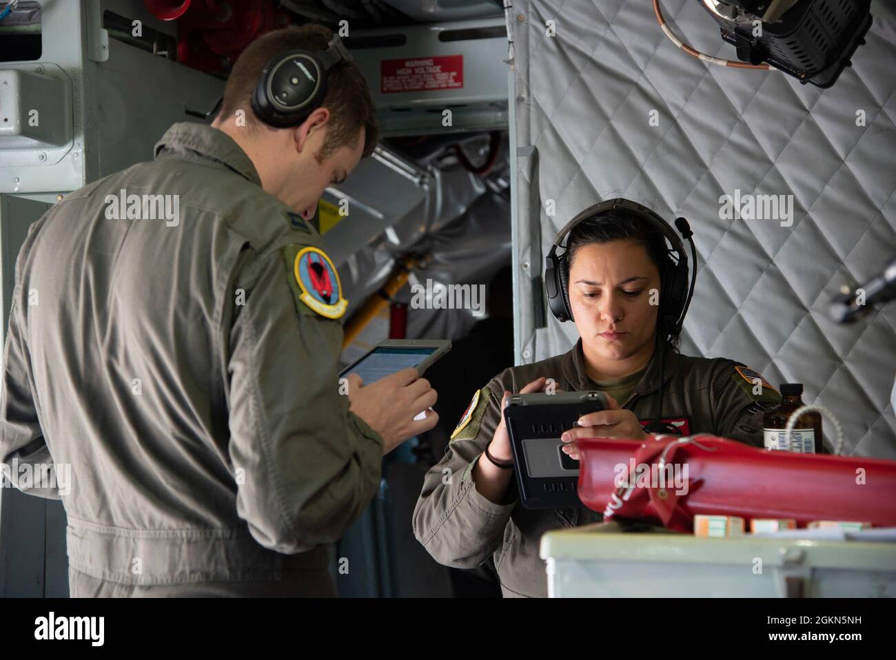 U.S. Air Force Capt. Travis Ledger and Capt. Bianca Santos, pilots ...