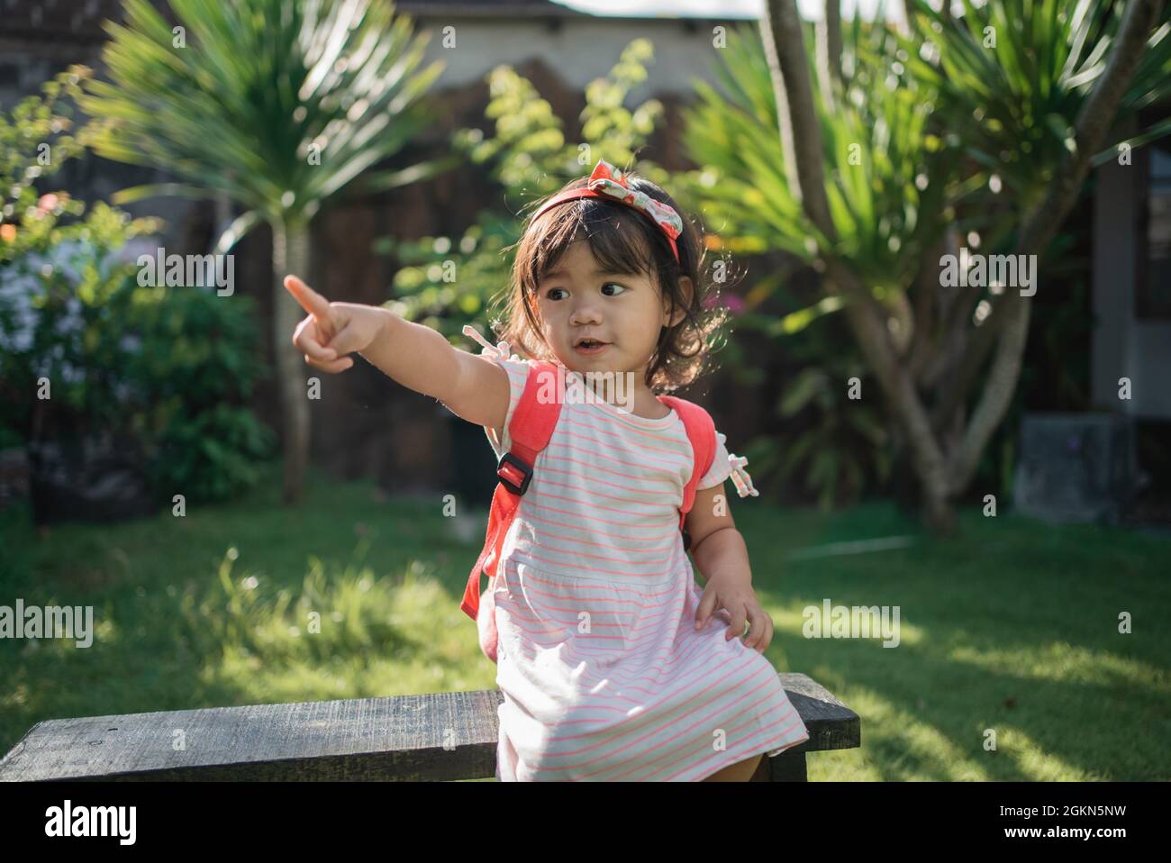 happy beautiful asian preschoolers toddler student pointing Stock Photo ...