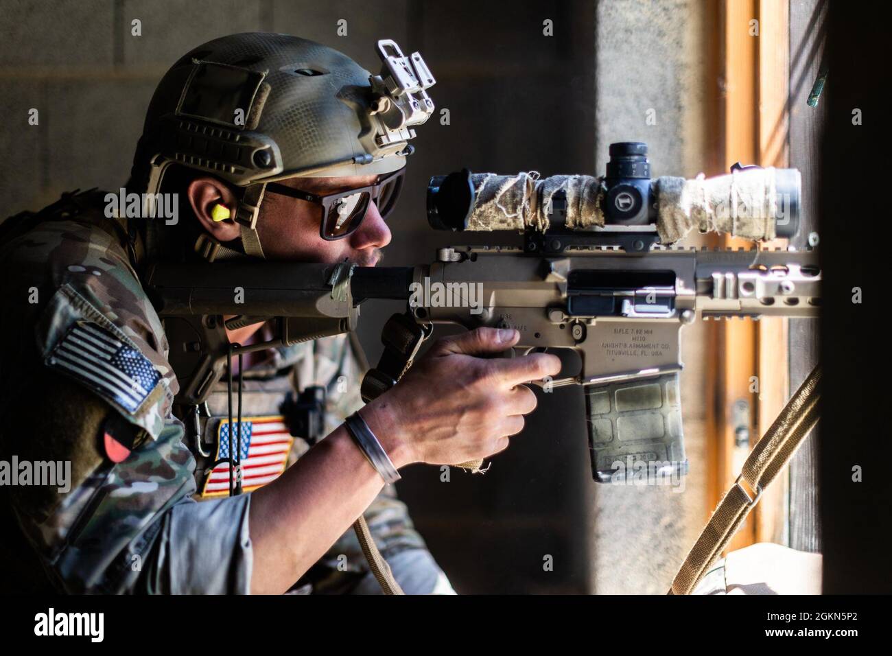 A U.S. Army Special Forces sniper engages a target at the International ...