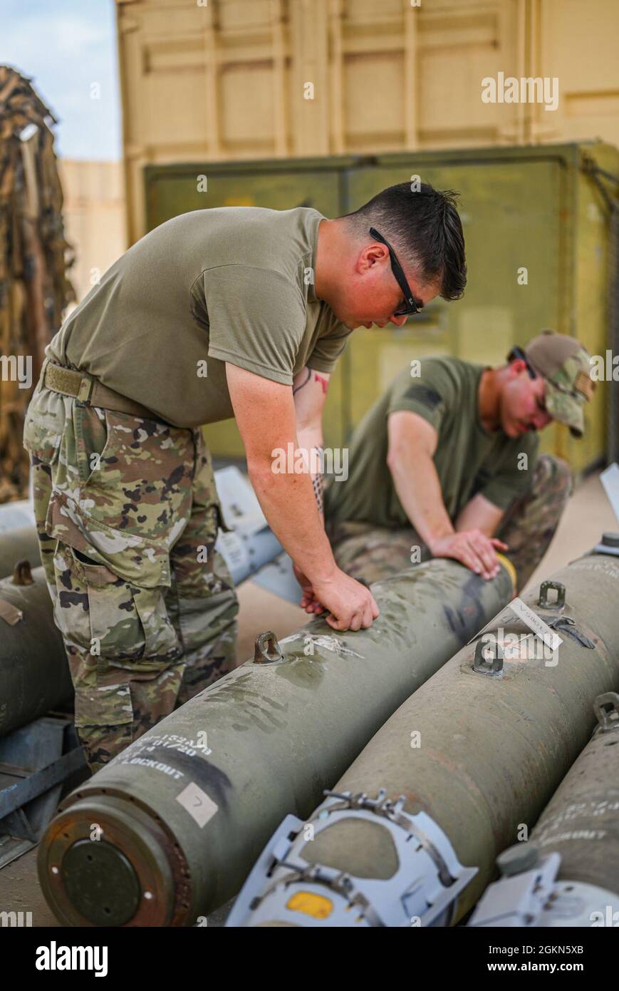 Airmen assigned to the 726th Expeditionary Air Base Squadron munitions ...