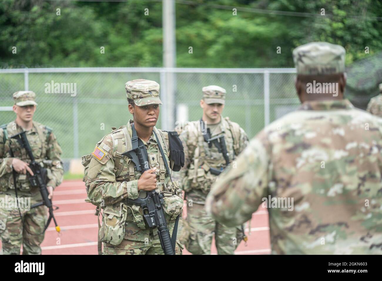 Pfc. Kyle Kingman (left), Spc. Brooke Hendricks (middle), and Spc. Seth ...