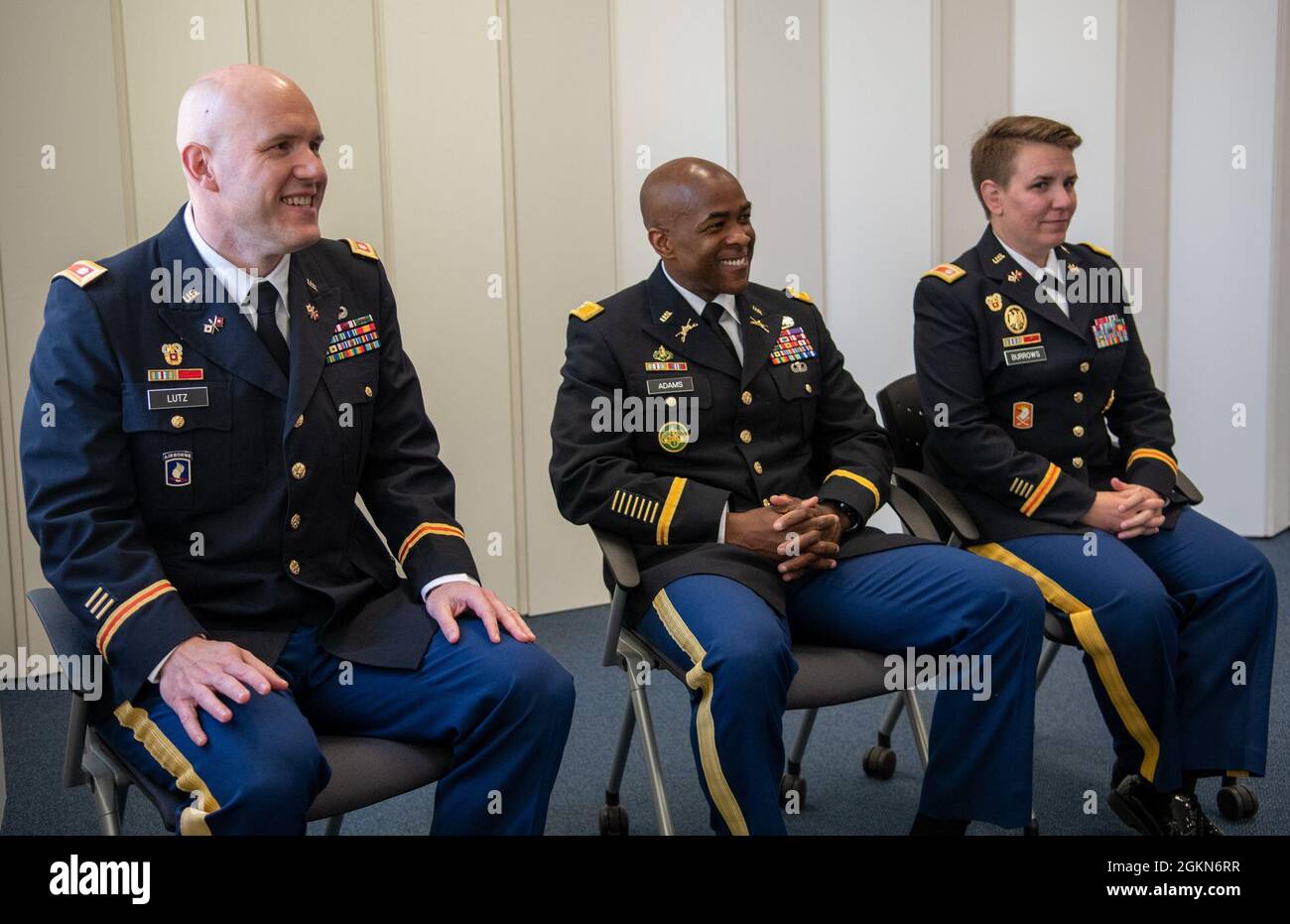 Outgoing Director of the US Army 409th Theater Contracting Center, LTC Thomas R. Lutz (left ...