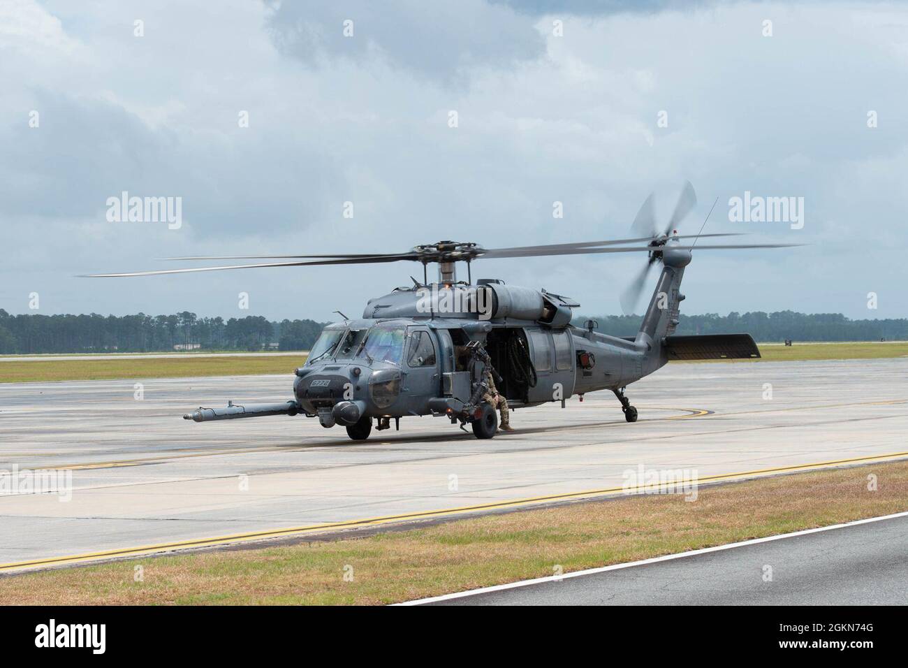 U.S. Air Force Col. Ben Conde, 23d Wing vice commander, taxis an HH-60G ...