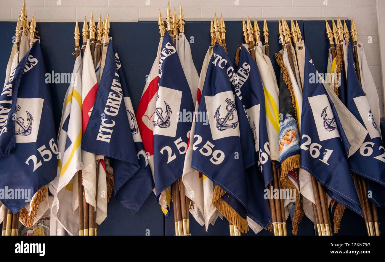 Division flags for graduating training group 28 sit staged inside ...