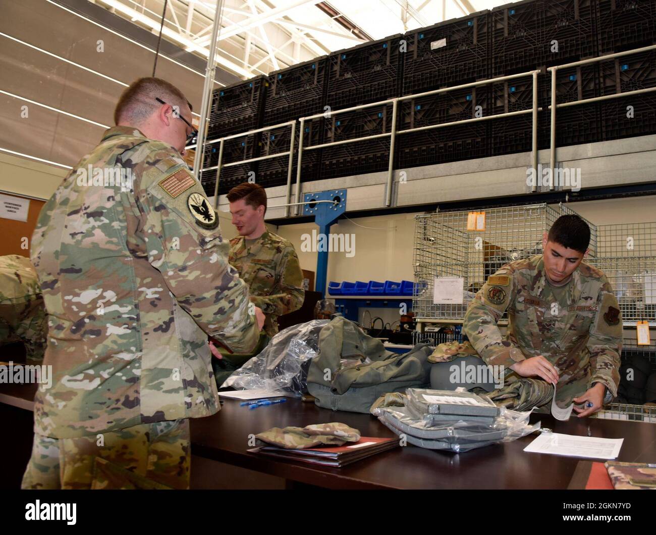 Members of the 110th Wing get issued gear from supply while taking part ...