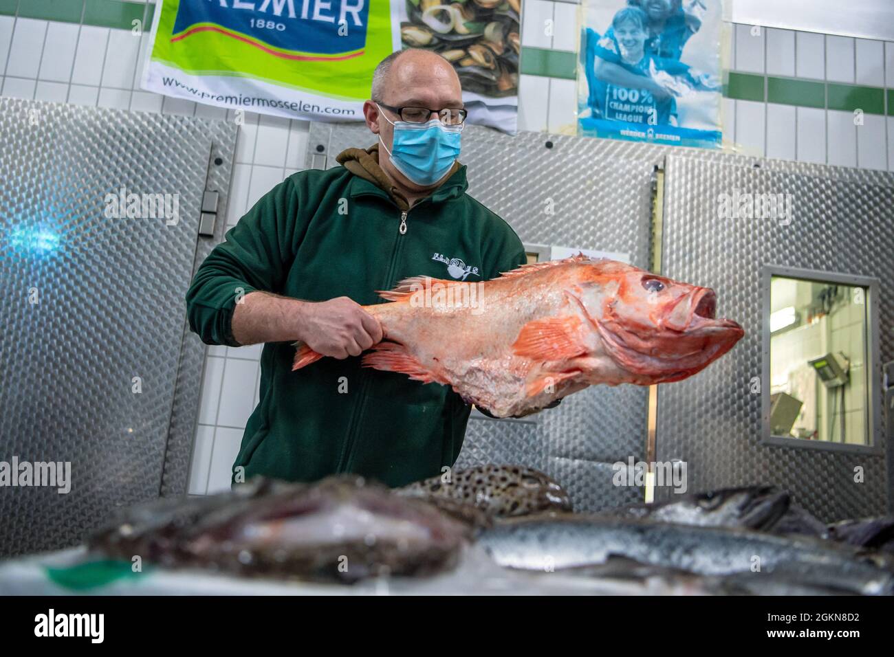 Bremen, Germany. 15th Sep, 2021. Uwe Koch-Bodes, fishmonger, sells fish ...