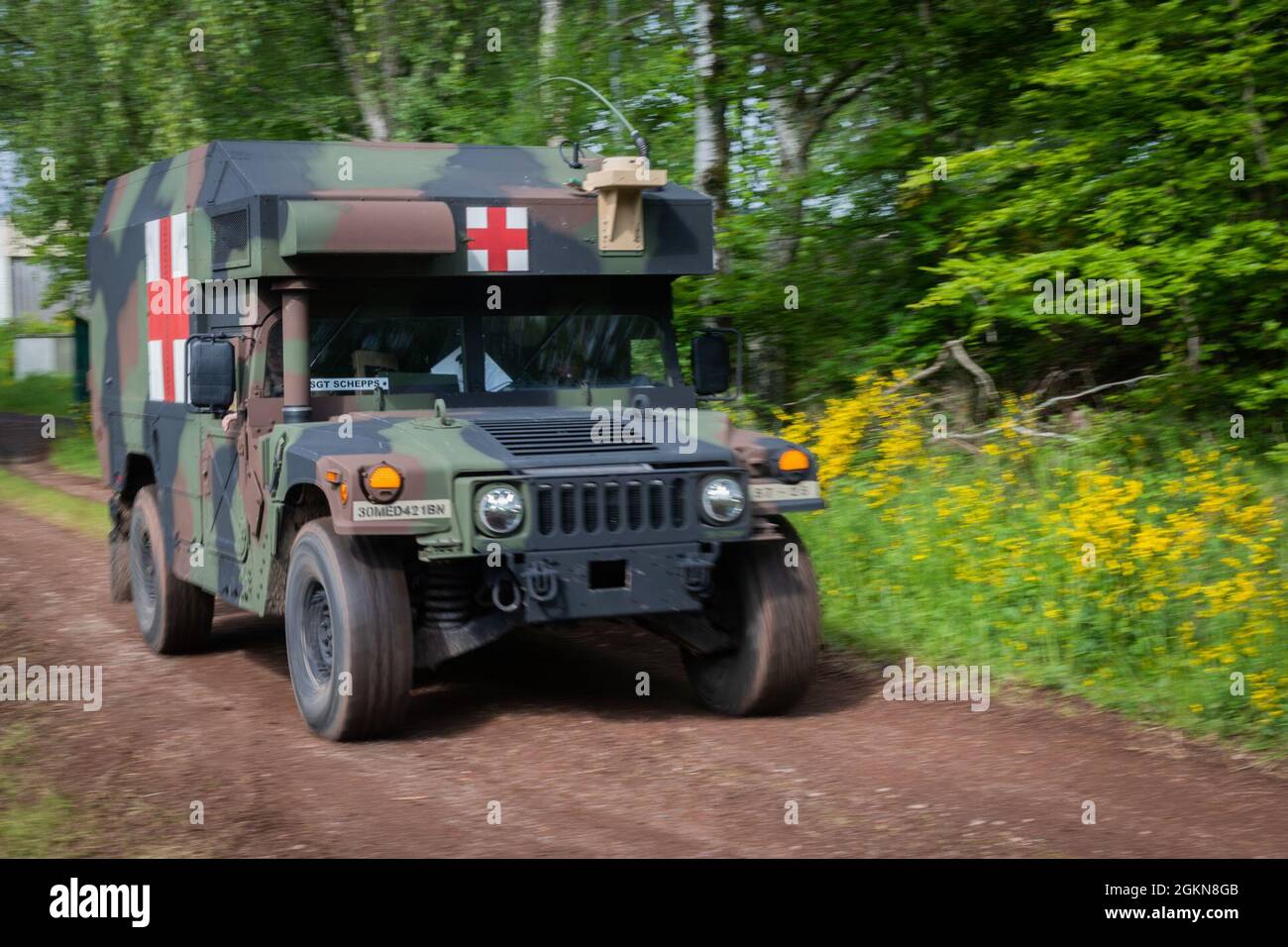 U.S. Soldiers with 30th Medical Brigade transport a simulated casualty ...