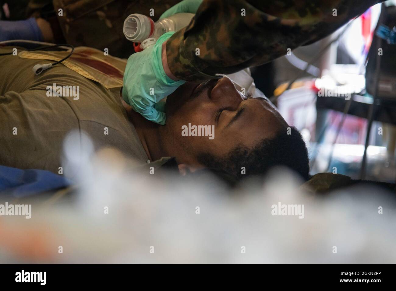 U.S. Soldiers with 30th Medical Brigade and NATO partners treat a ...