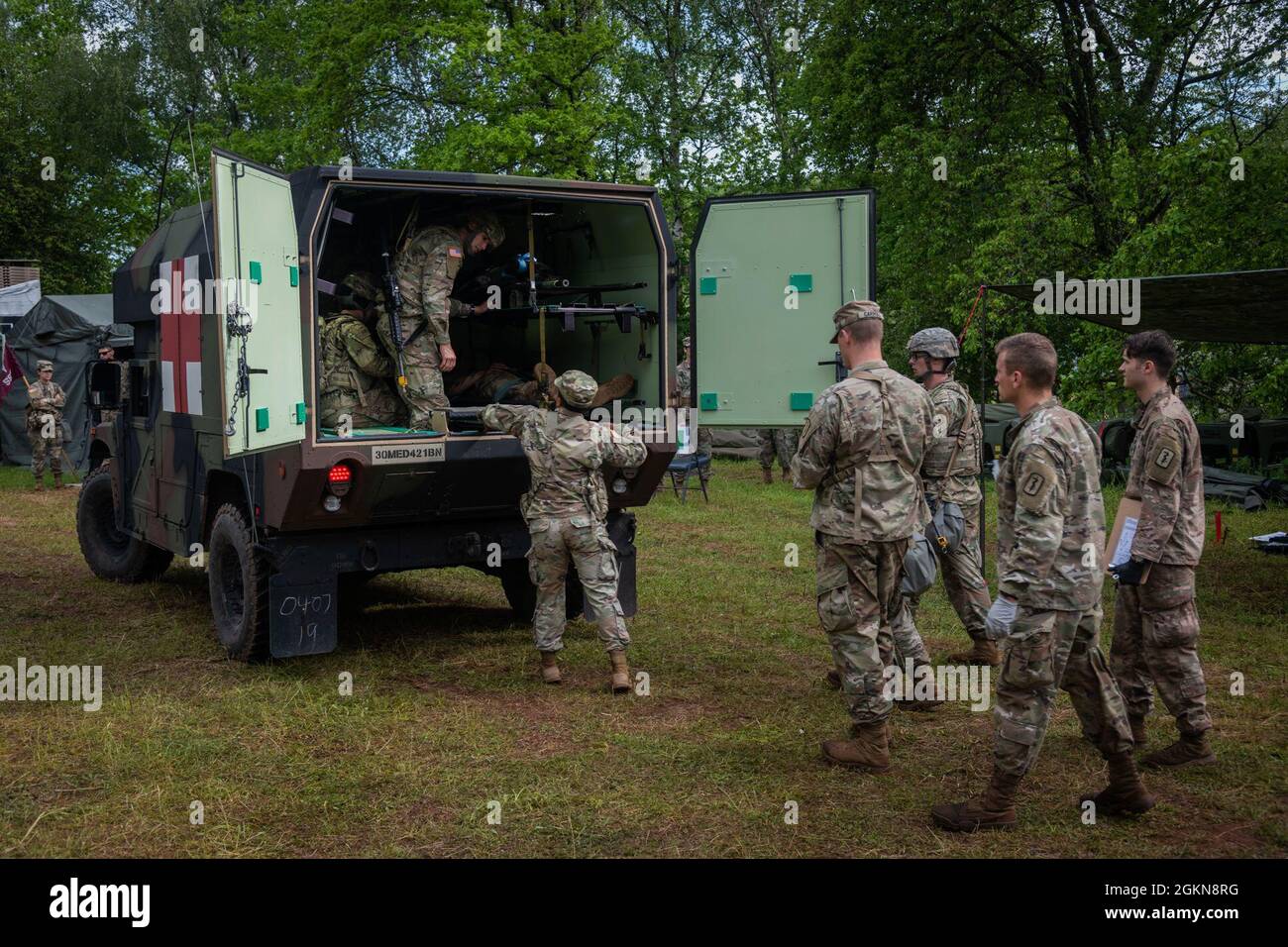 U.S. Army Soldiers with 557th Medical Company Area Support unload a ...