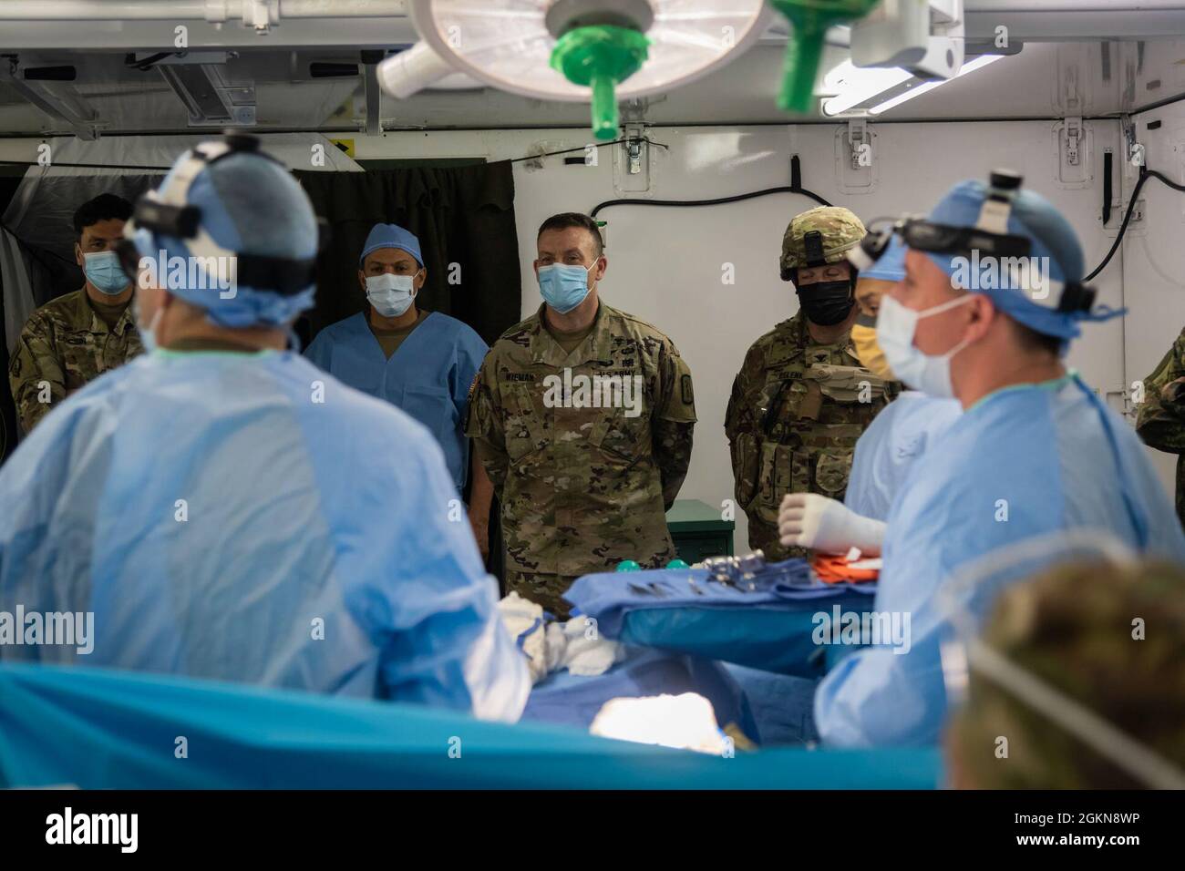 U.S. Soldiers with 30th Medical Brigade explain the operating room ...