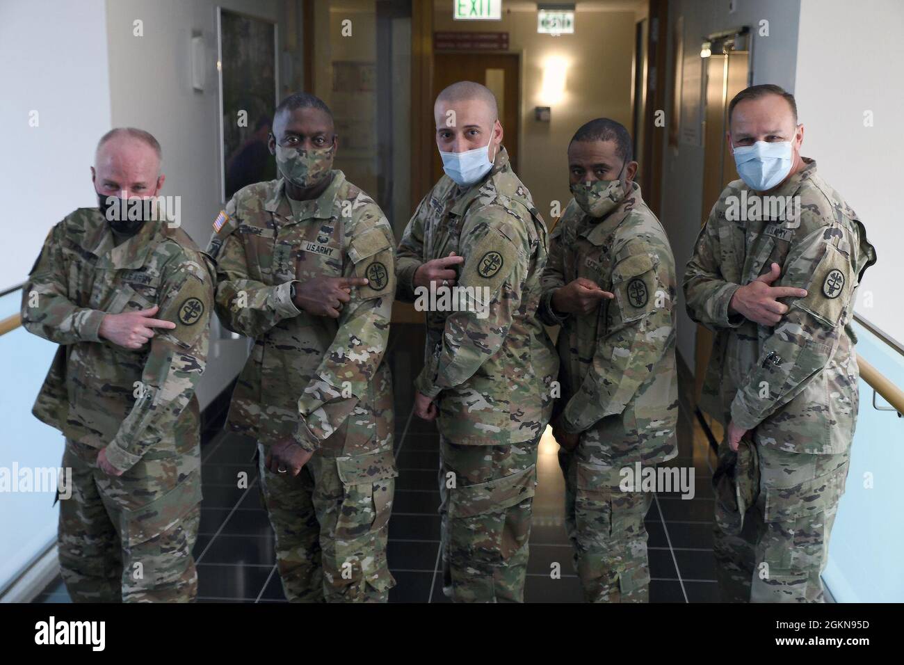 From left to right, Brig. Gen. Mark Thompson, commanding general for ...