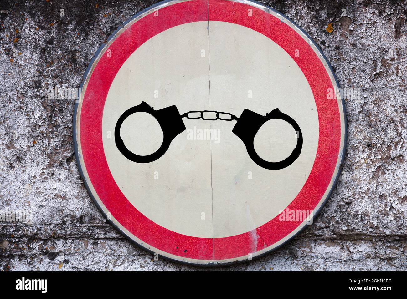 images of handcuffs on a road sign. road crime concept. High quality ...