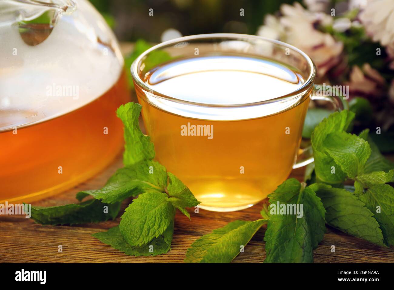Cup of mint tea on table Stock Photo - Alamy
