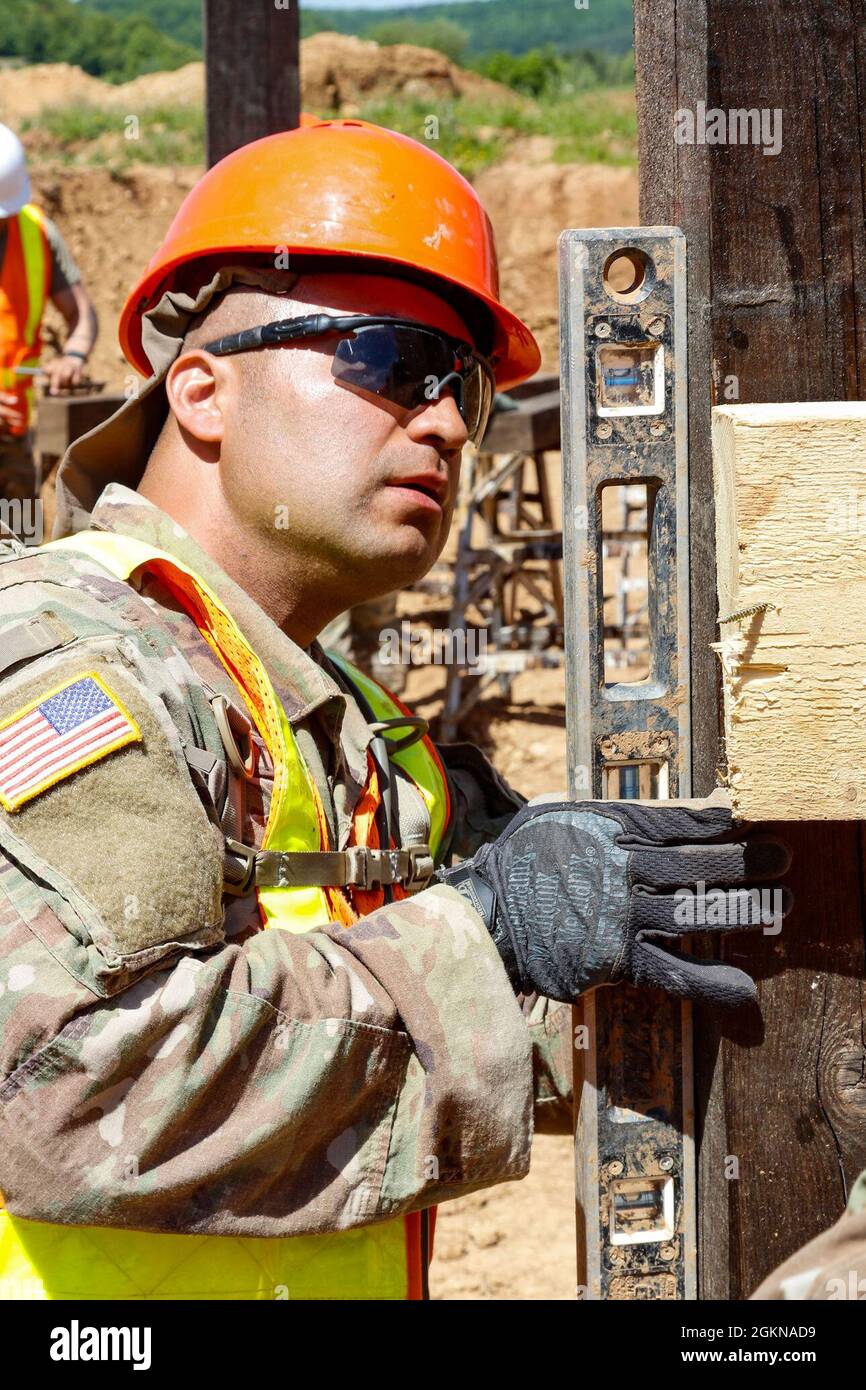 Sgt. Edgar Ortiz, left, a horizontal engineer with third platoon ...