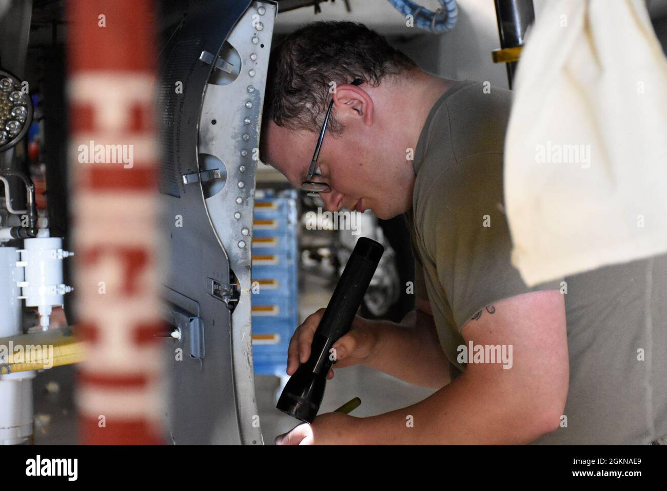 An Airman assigned to the 442d Maintenance Group inspects the A-10 ...