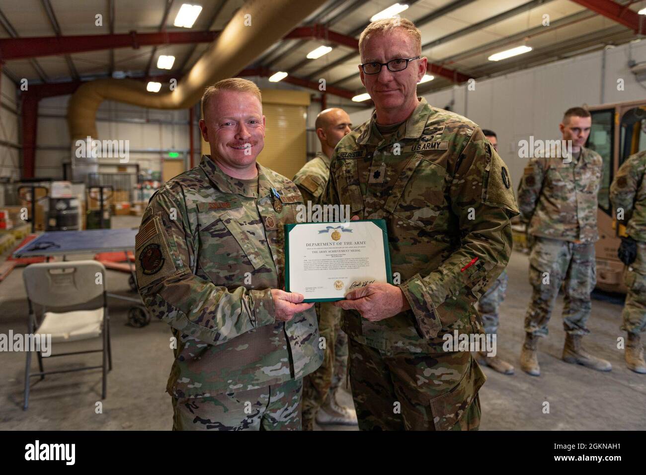 U.S. Air Force Master Sgt. Michael Collins, left, 386th Expeditionary ...