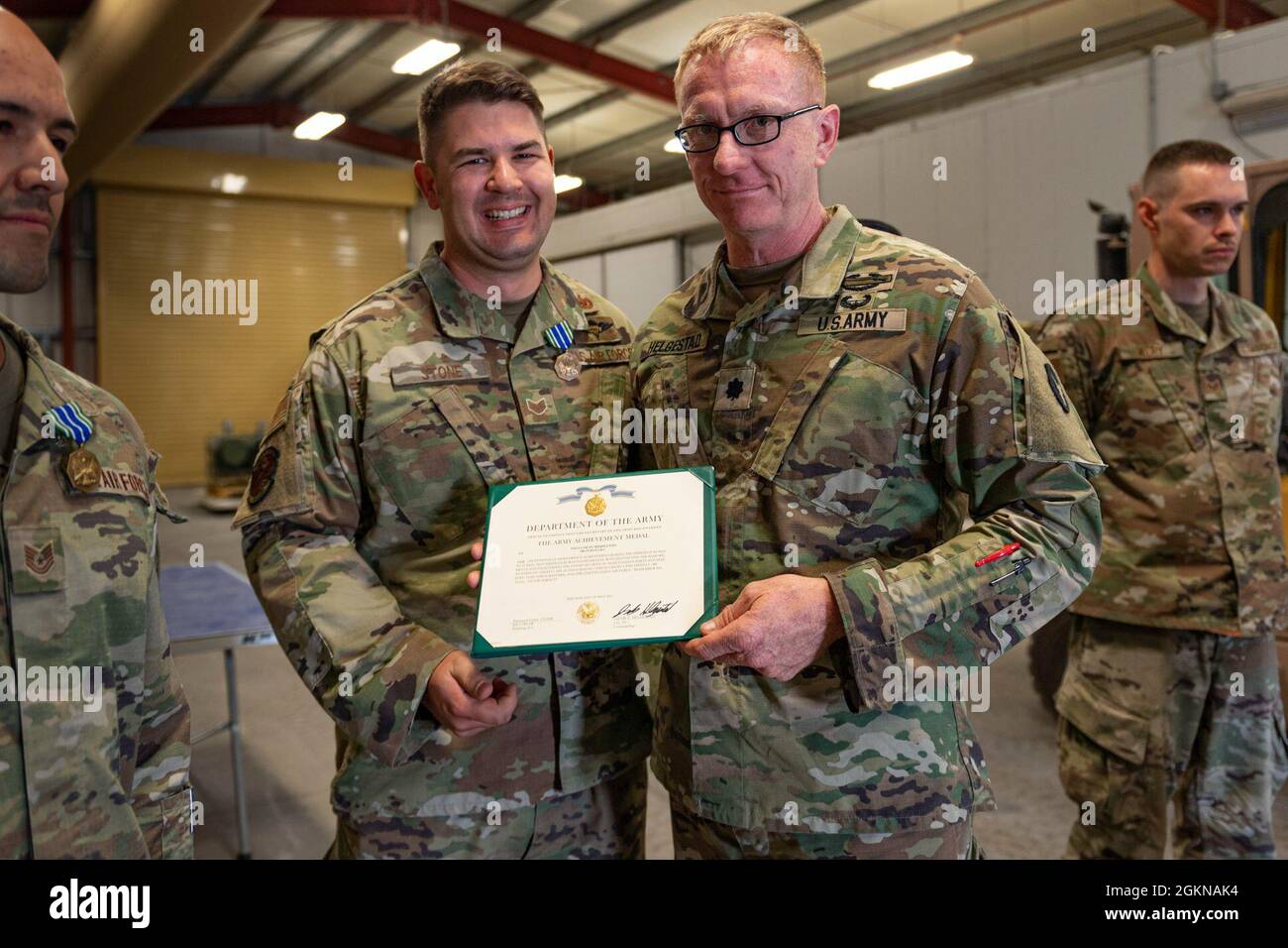 U.S. Air Force Staff Sgt. Stephen Stone, left, 386th Expeditionary ...