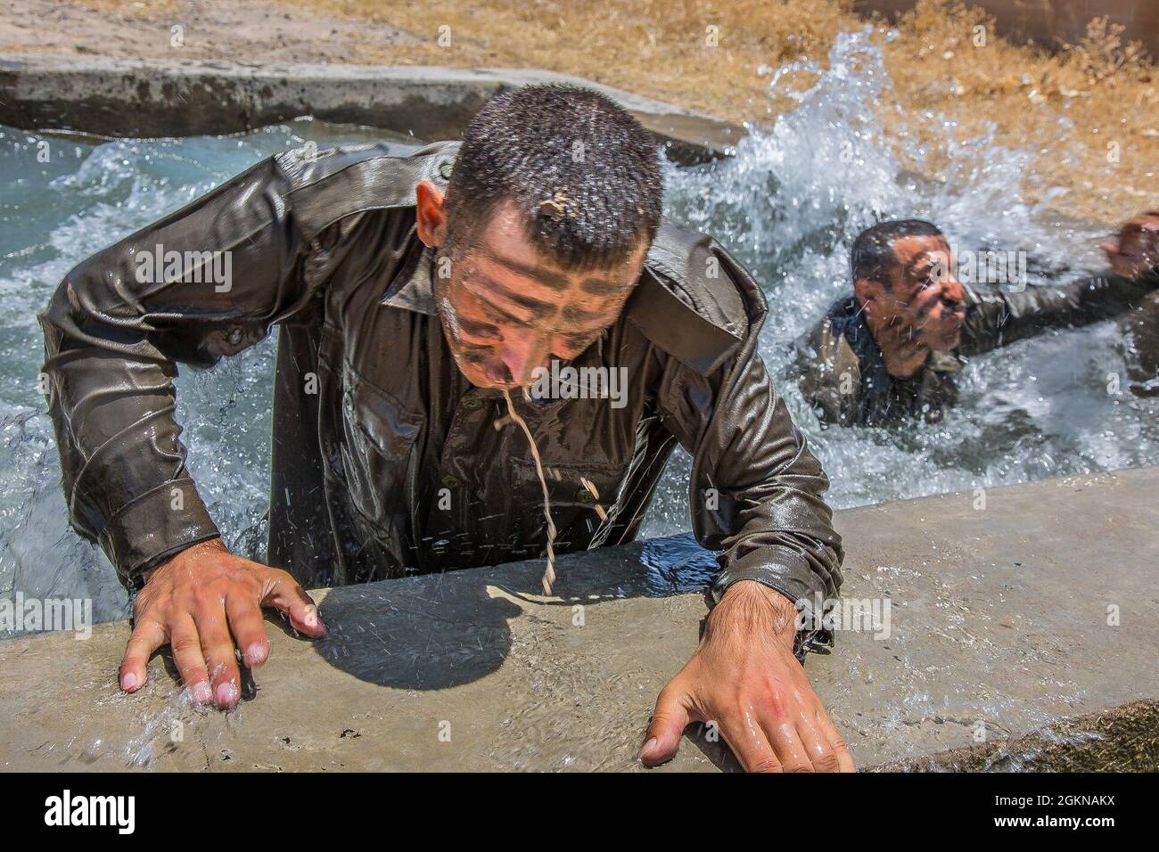 Newly recruited trainees to the Kurdish Security Forces conduct an ...