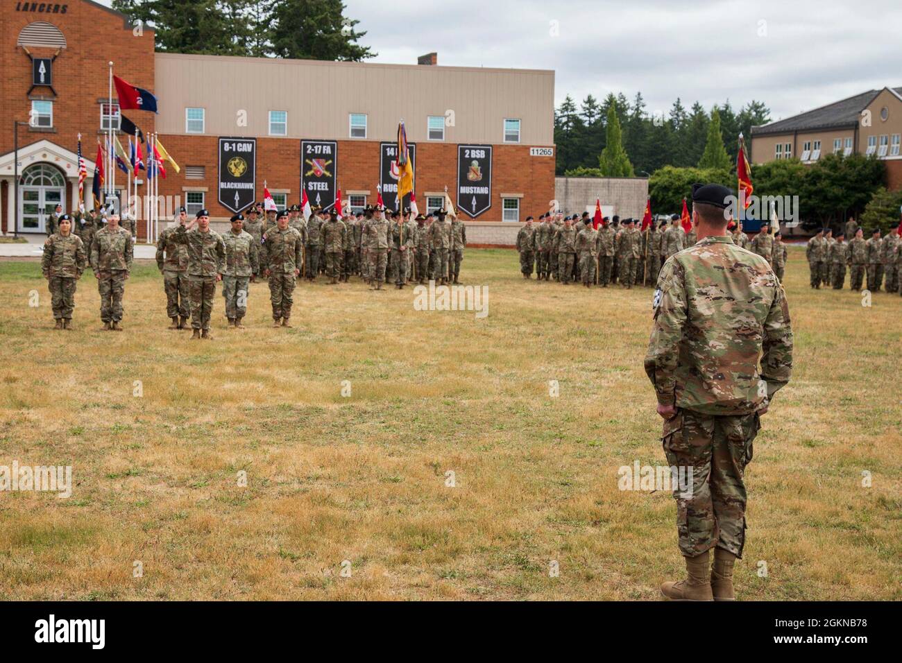 U.S. Army soldier Col. Chad Roehrman acknowledges his command over 2nd Stryker Brigade Combat ...