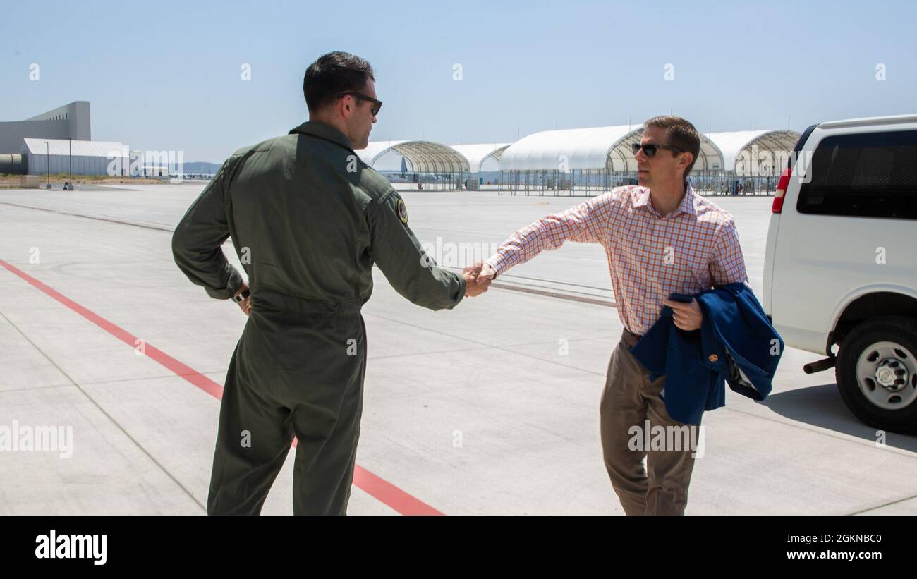 Maj. Robert Ahern (left), a pilot with Marine Fighter Attack Squadron ...