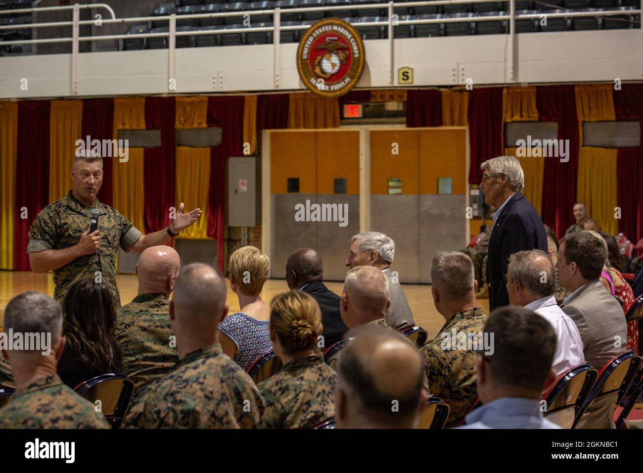 U.S. Marine Corps Maj. Gen. Julian D. Alford, left, outgoing commanding ...