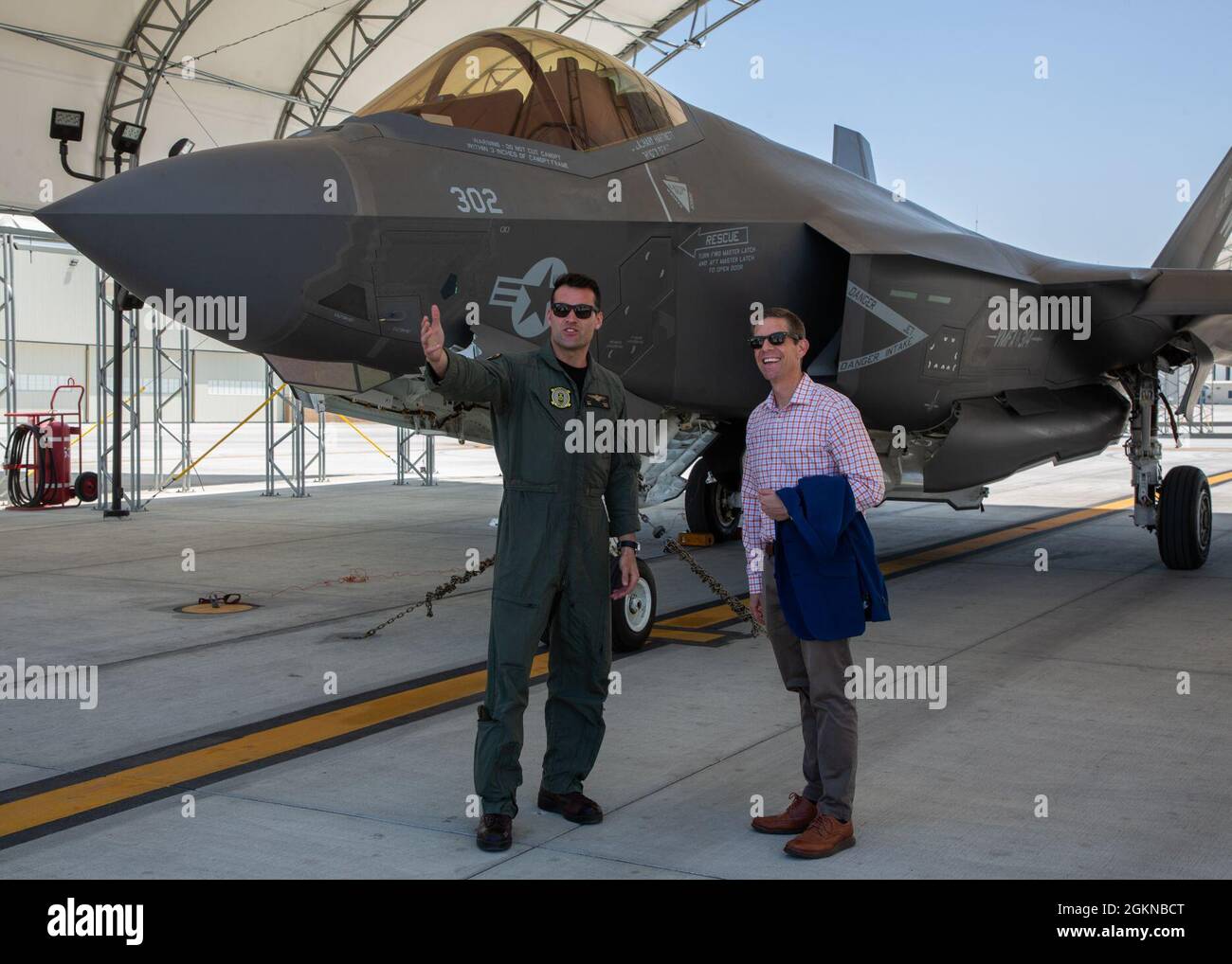Maj. Robert Ahern (left), a pilot with Marine Fighter Attack Squadron ...
