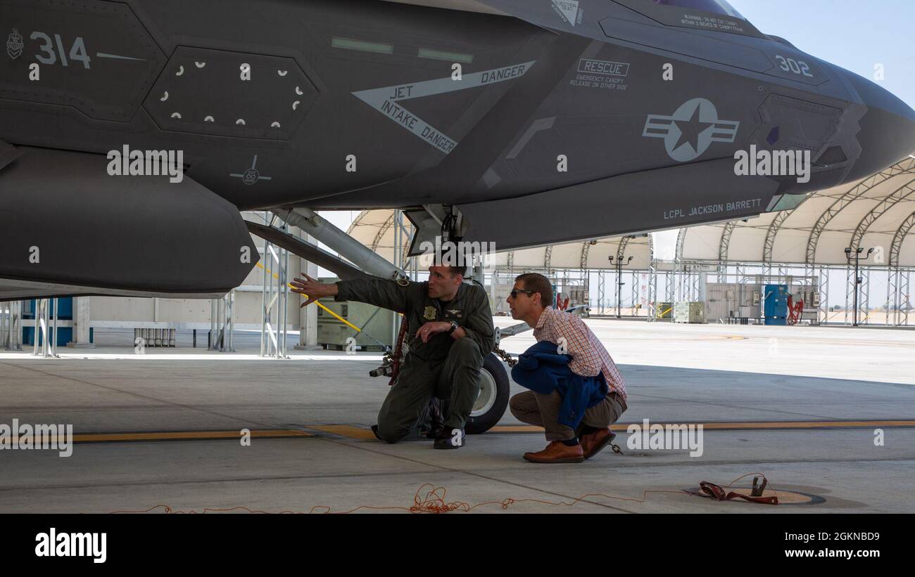 Maj. Robert Ahern (left), a pilot with Marine Fighter Attack Squadron ...