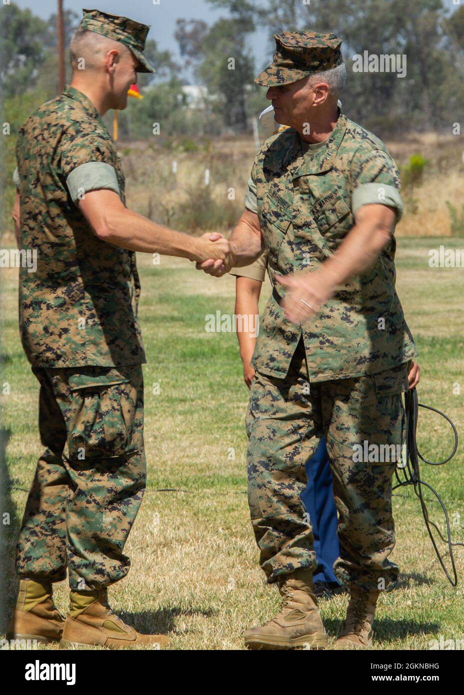 U.S. Marine Corps Maj. Gen. Christopher J. Mahoney (right), the ...